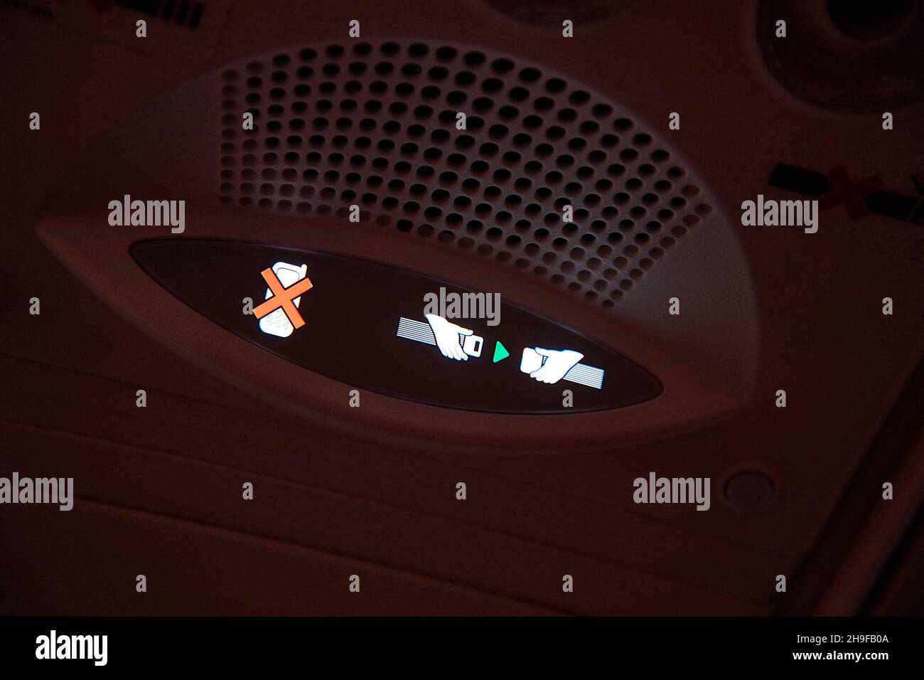 Plane cabin signs Stock Photo - Alamy