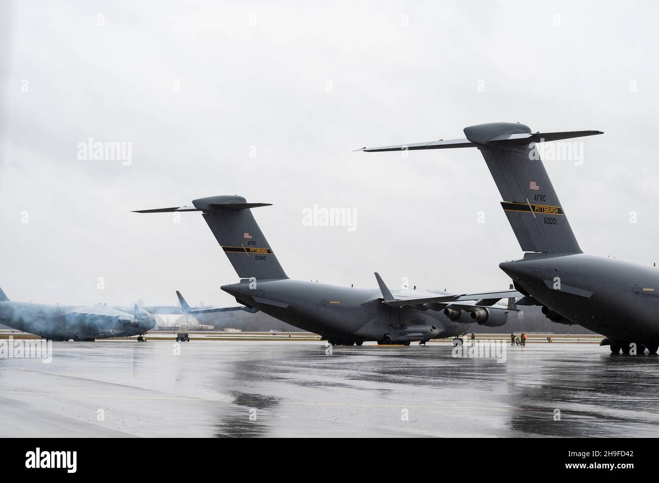 Airmen assigned to the 911th Aircraft Maintenance Squadron conduct an ...