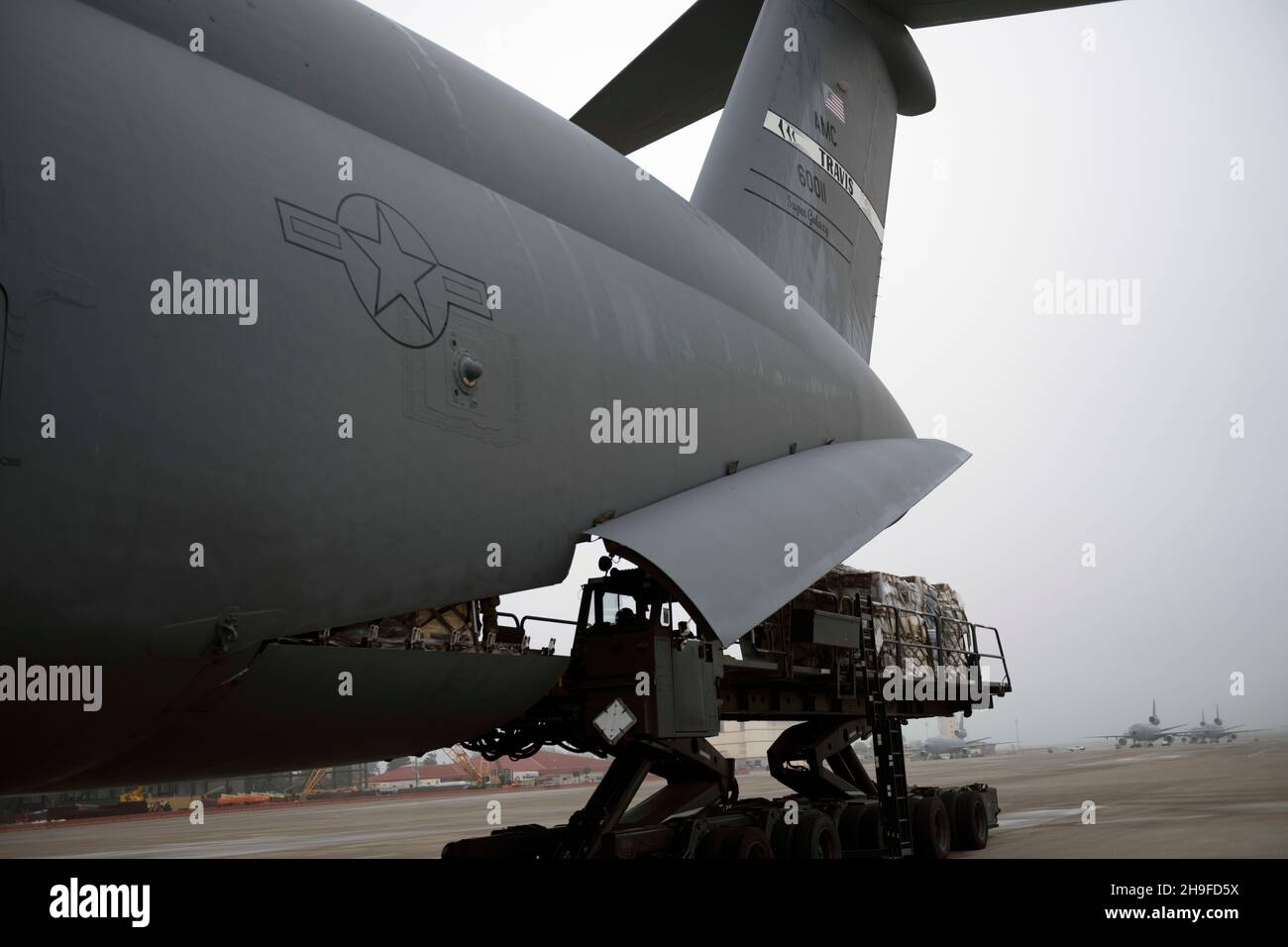 U.S. Airmen assigned to the 60th Aerial Port Squadron and 312th Airlift ...