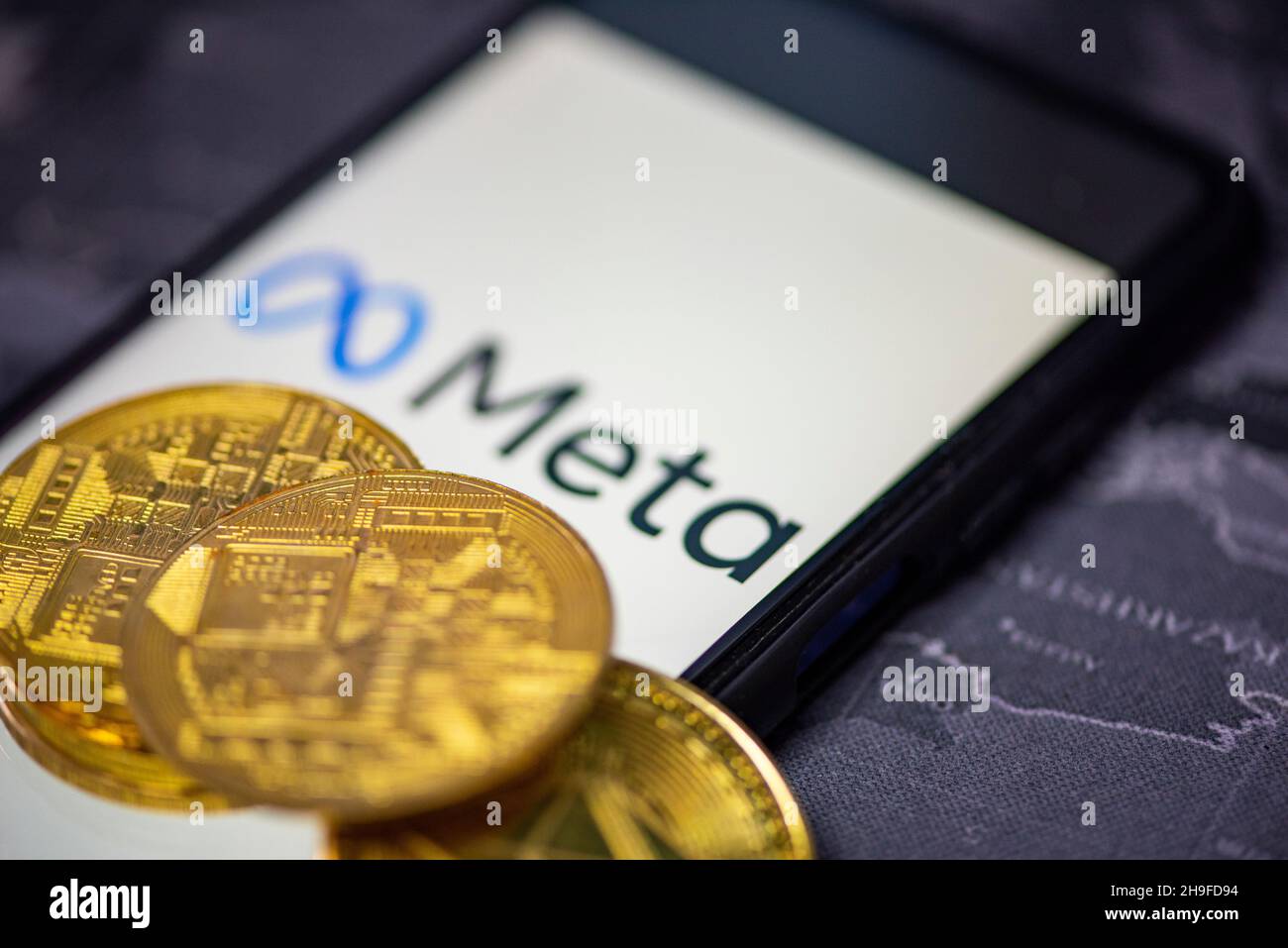 Metaverse coin concept, META on smartphone screen with gold coin on ...