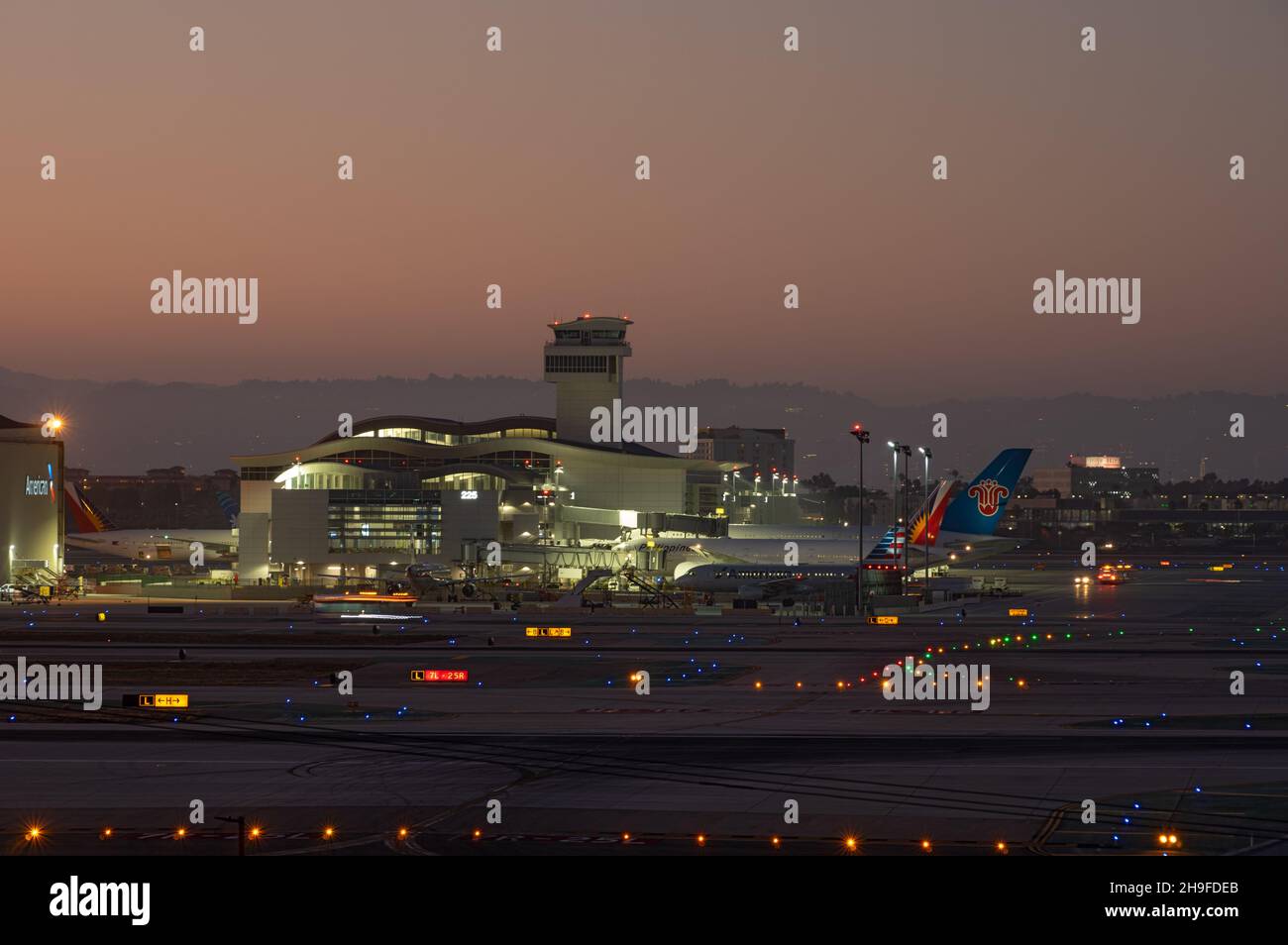 The new Midfield Satellite Concourse North terminal shown at dusk at ...