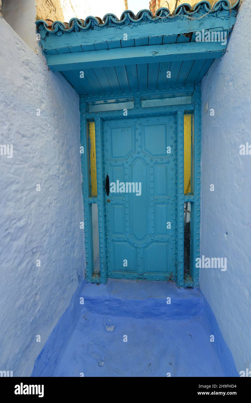 A traditional blue door in the old city of Chefchaouen, Morocco Stock ...