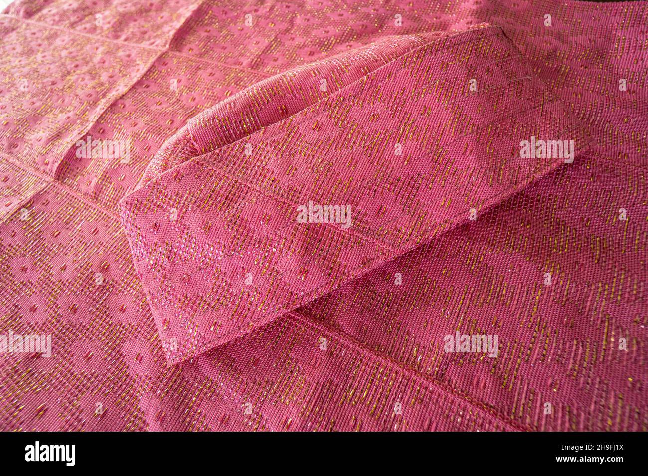 Tradional Pink Nigerian Cap ready to wear to a party Stock Photo - Alamy