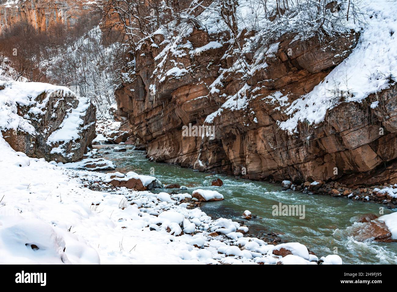 Fast mountain river in the gorge at winter season Stock Photo - Alamy