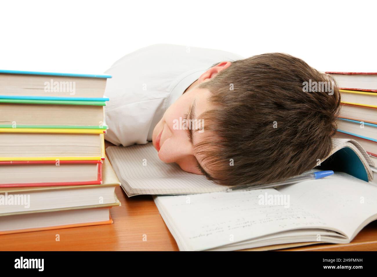 Tired Student sleep on the School Desk on the White Background Stock ...