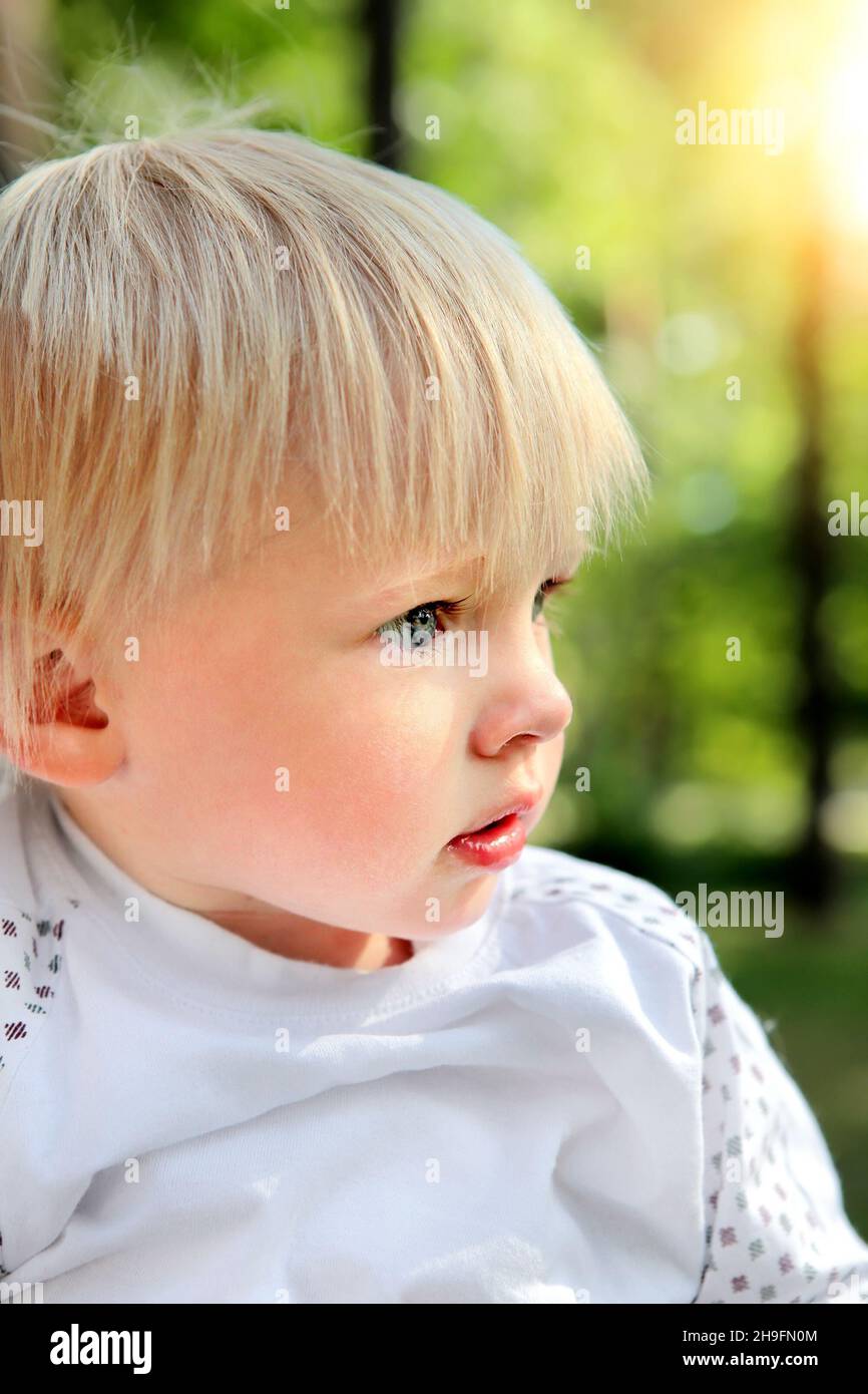Sad Child Portrait at the Summer Park Stock Photo - Alamy