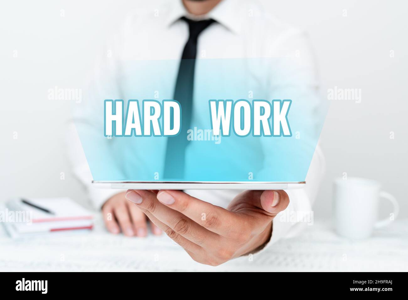 Conceptual caption Hard Work. Word for always putting a lot of effort ...