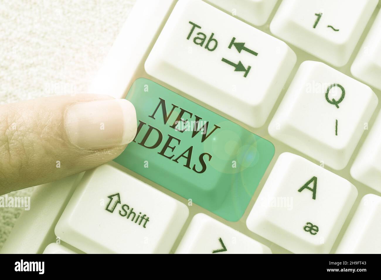 Text caption presenting New Ideas. Word Written on something original ...