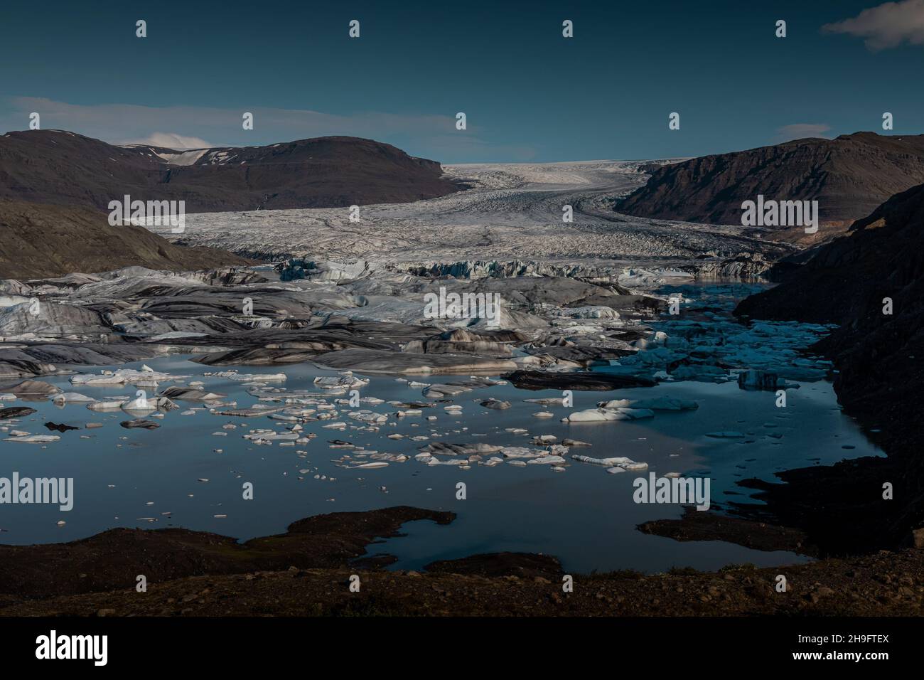 Panoramic photo of icelandic glacier at Hoffell taken on a sunny day ...
