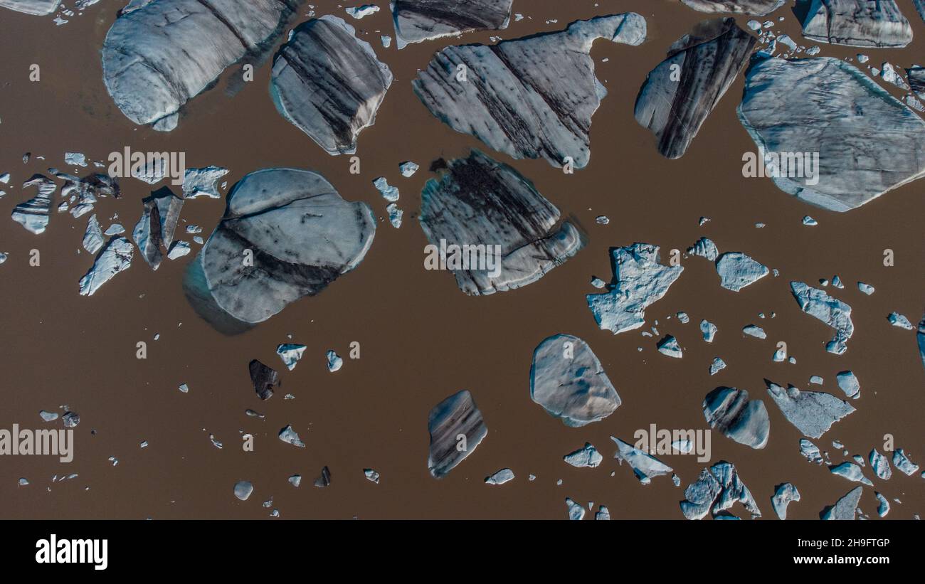 Bick blocks of glacier ice broken from big glacier at hoffell, iceland ...