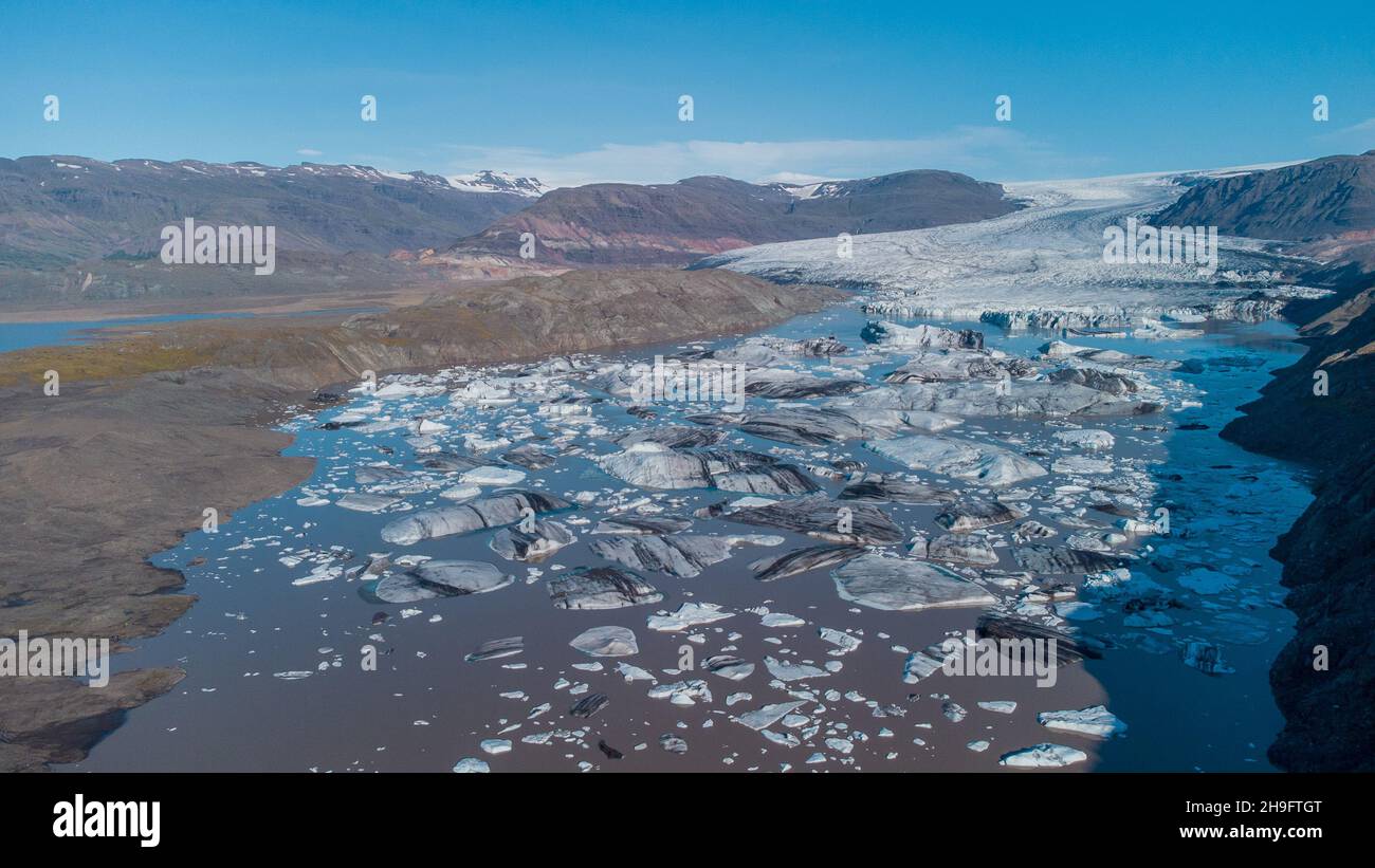 Bick blocks of glacier ice broken from big glacier at hoffell, iceland ...
