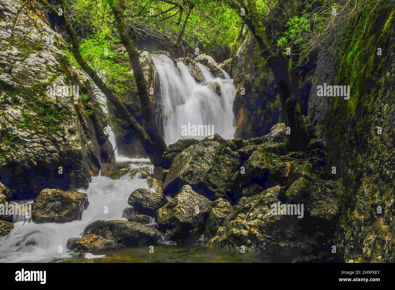 Natural river of water that flows permanently Stock Photo - Alamy