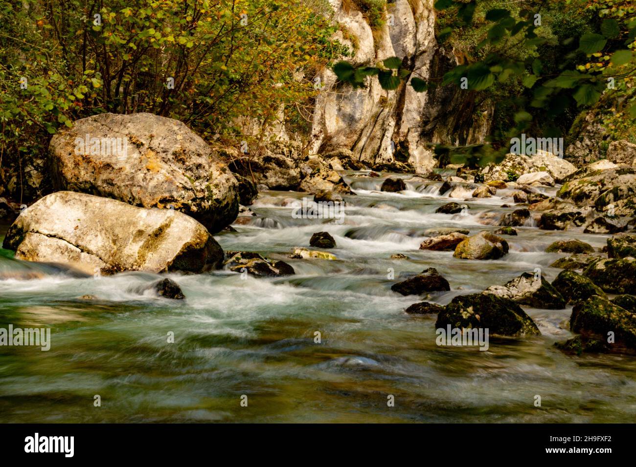 Natural river of water that flows permanently Stock Photo - Alamy