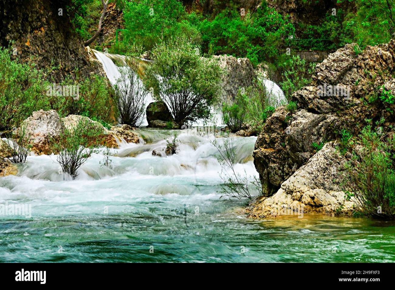 Natural river of water that flows permanently Stock Photo - Alamy