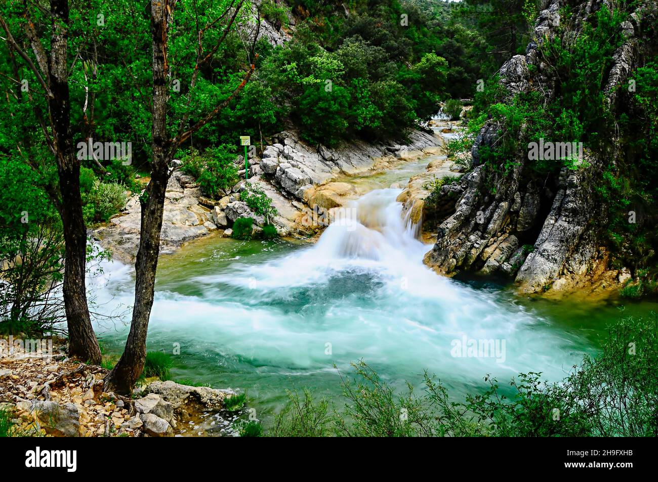 Natural river of water that flows permanently Stock Photo - Alamy
