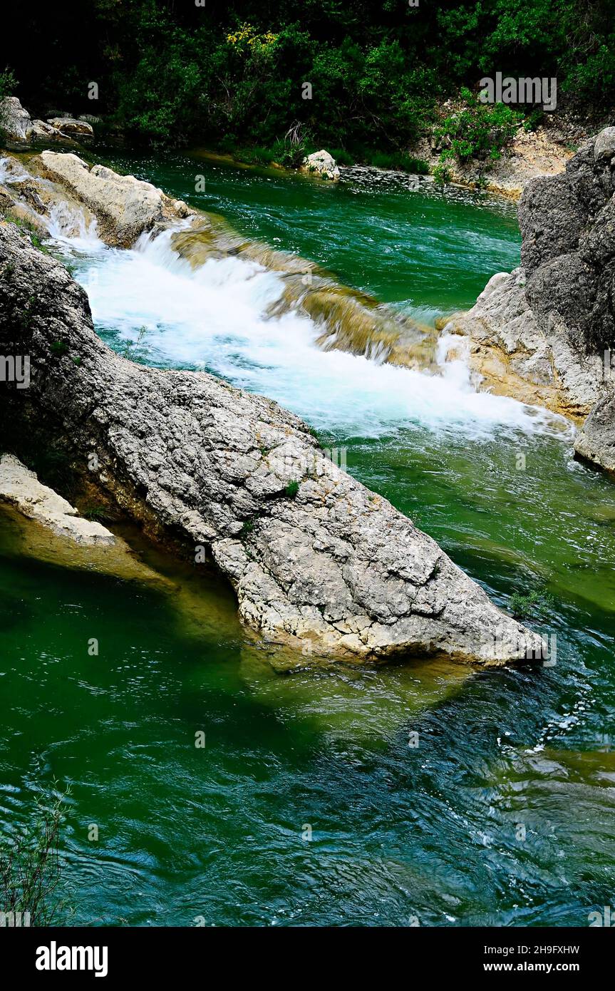 Natural river of water that flows permanently Stock Photo - Alamy
