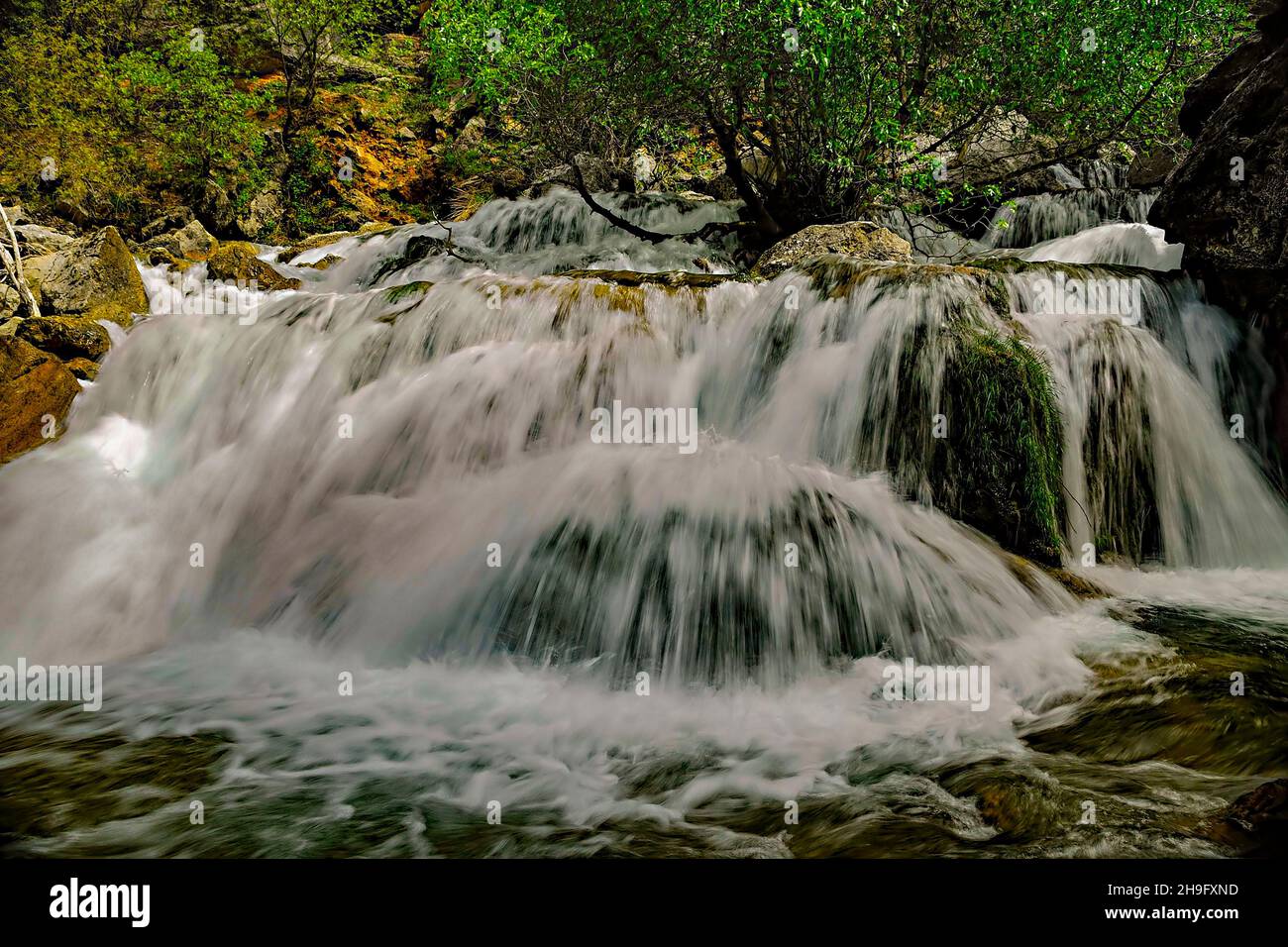 Natural river of water that flows permanently Stock Photo - Alamy