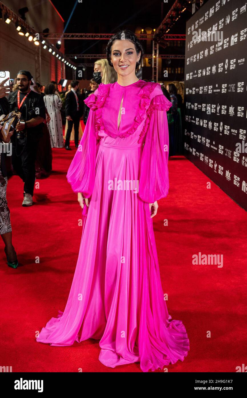Jaddah, Saudi Arabia. 06th Dec, 2021. Lebanese actress Razane Jammal walks the red carpet as she ...