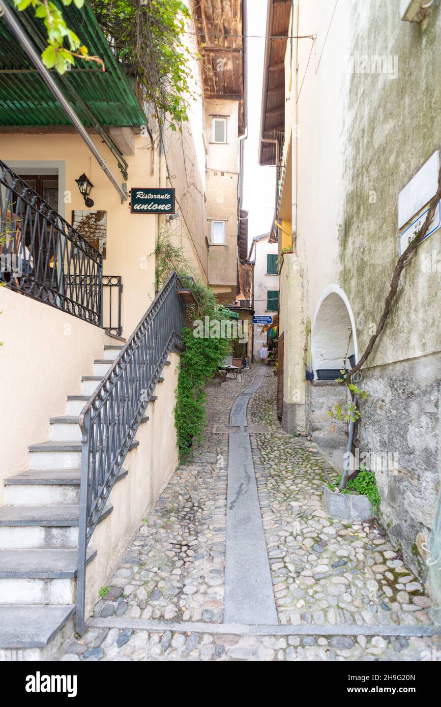 Narrow way between houses Stock Photo - Alamy