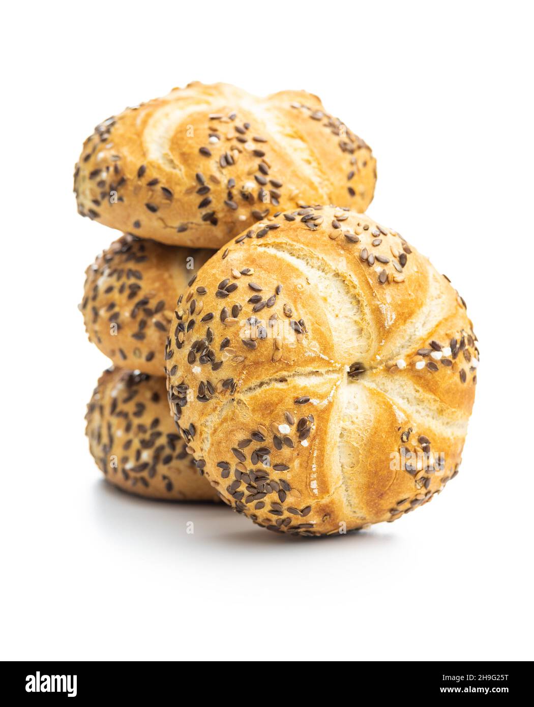 Four baked french buns with seeds isolated on white background Stock ...