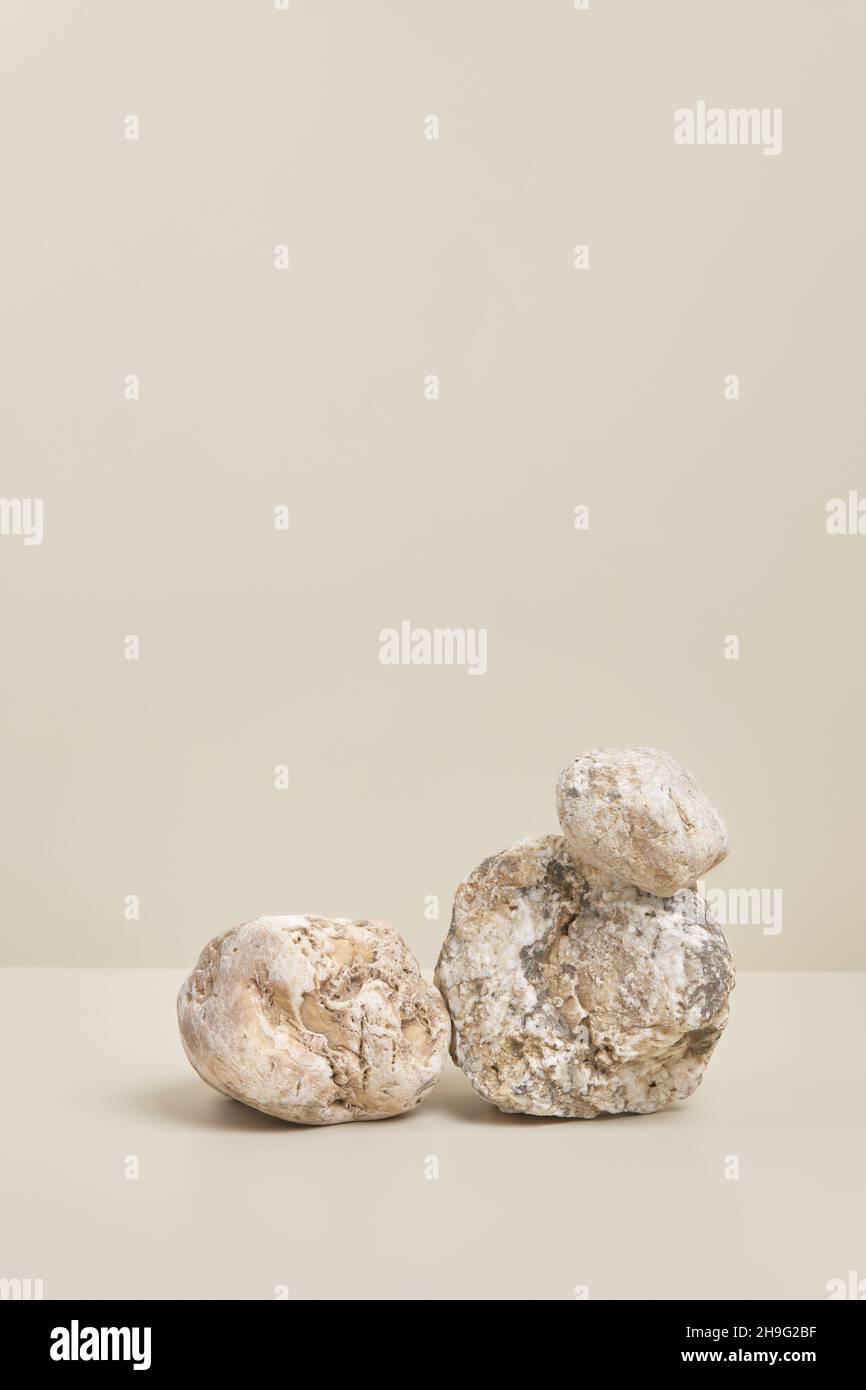 Nature scene with composition of beige and white stones Stock Photo - Alamy