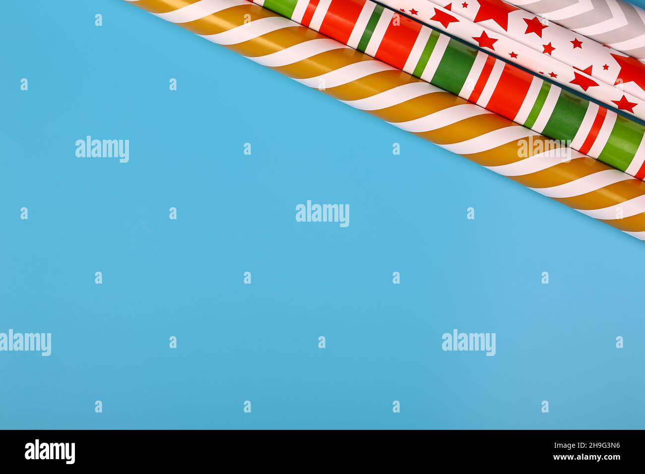 gift wrapping paper on a blue background. minimalistic christmas scandy ...