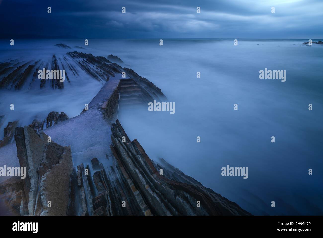 Itzurun Beach in Zumaia with the famous flysch coast in the Basque ...