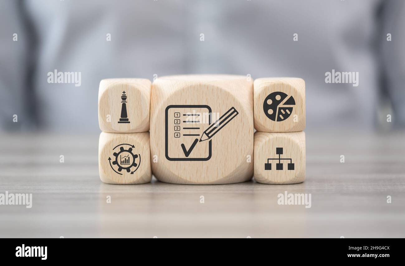 Wooden blocks with symbol of action plan concept Stock Photo - Alamy