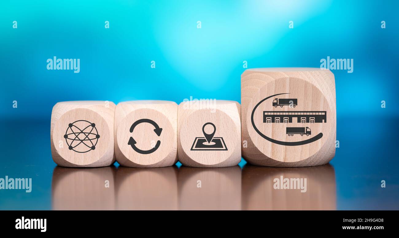 Wooden blocks with symbol of logistics concept on blue background Stock ...