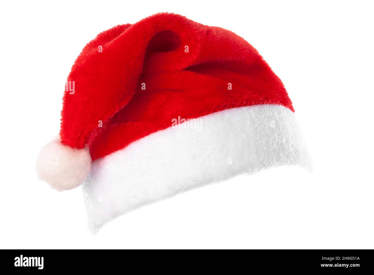 Red Christmas hat isolated on white background Stock Photo - Alamy