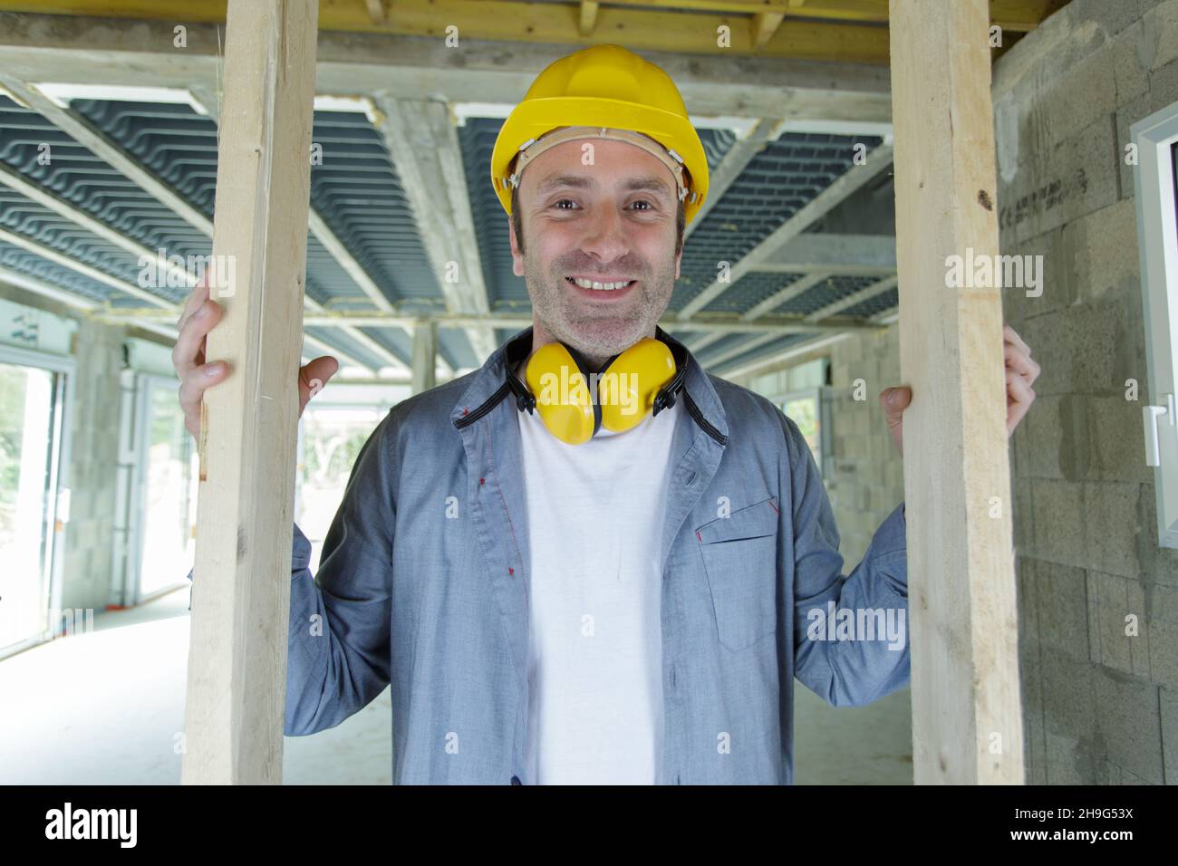 portrait of carpenter on indoor building construction site Stock Photo ...