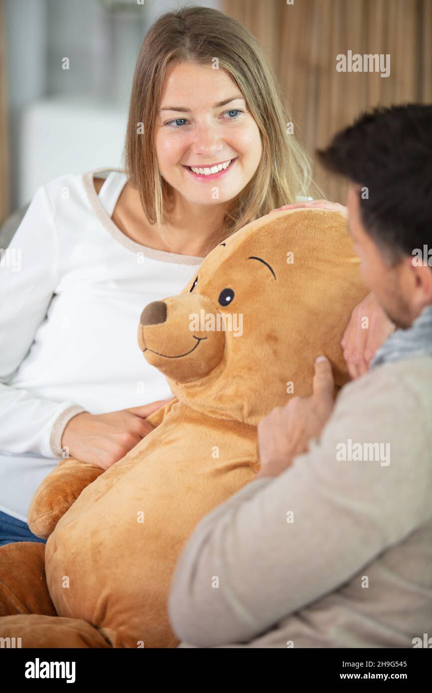couple with a teddy bear Stock Photo - Alamy