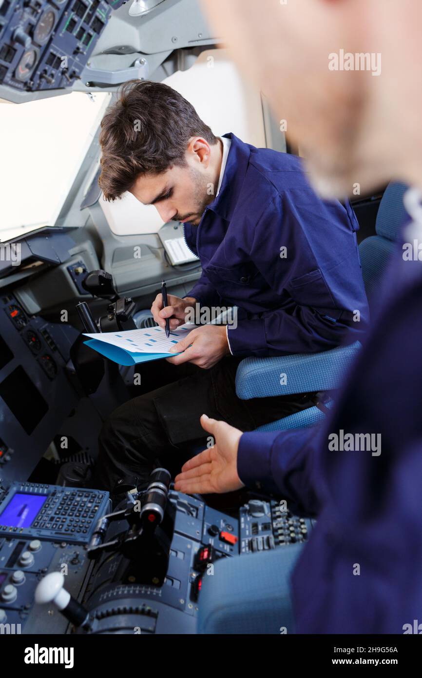 pilot student in uniform flying light craft plane Stock Photo - Alamy