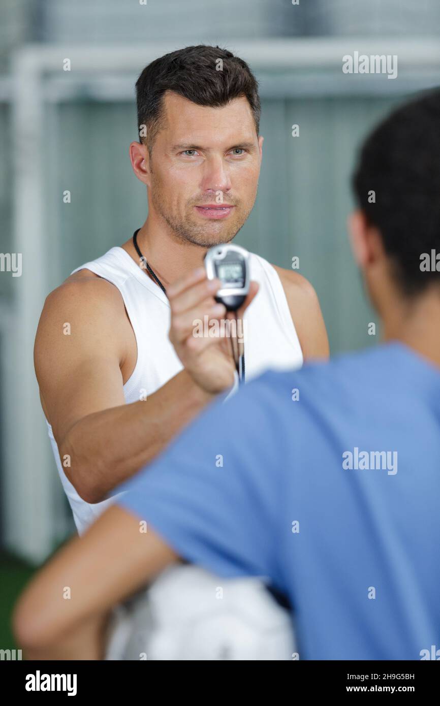 Man athlete stopwatch handsome hi-res stock photography and images - Alamy