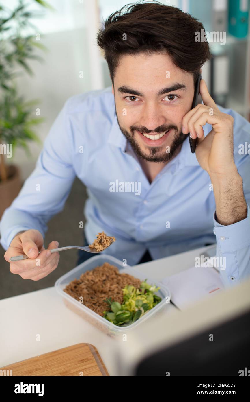 Man sandwich office desk hi-res stock photography and images - Alamy