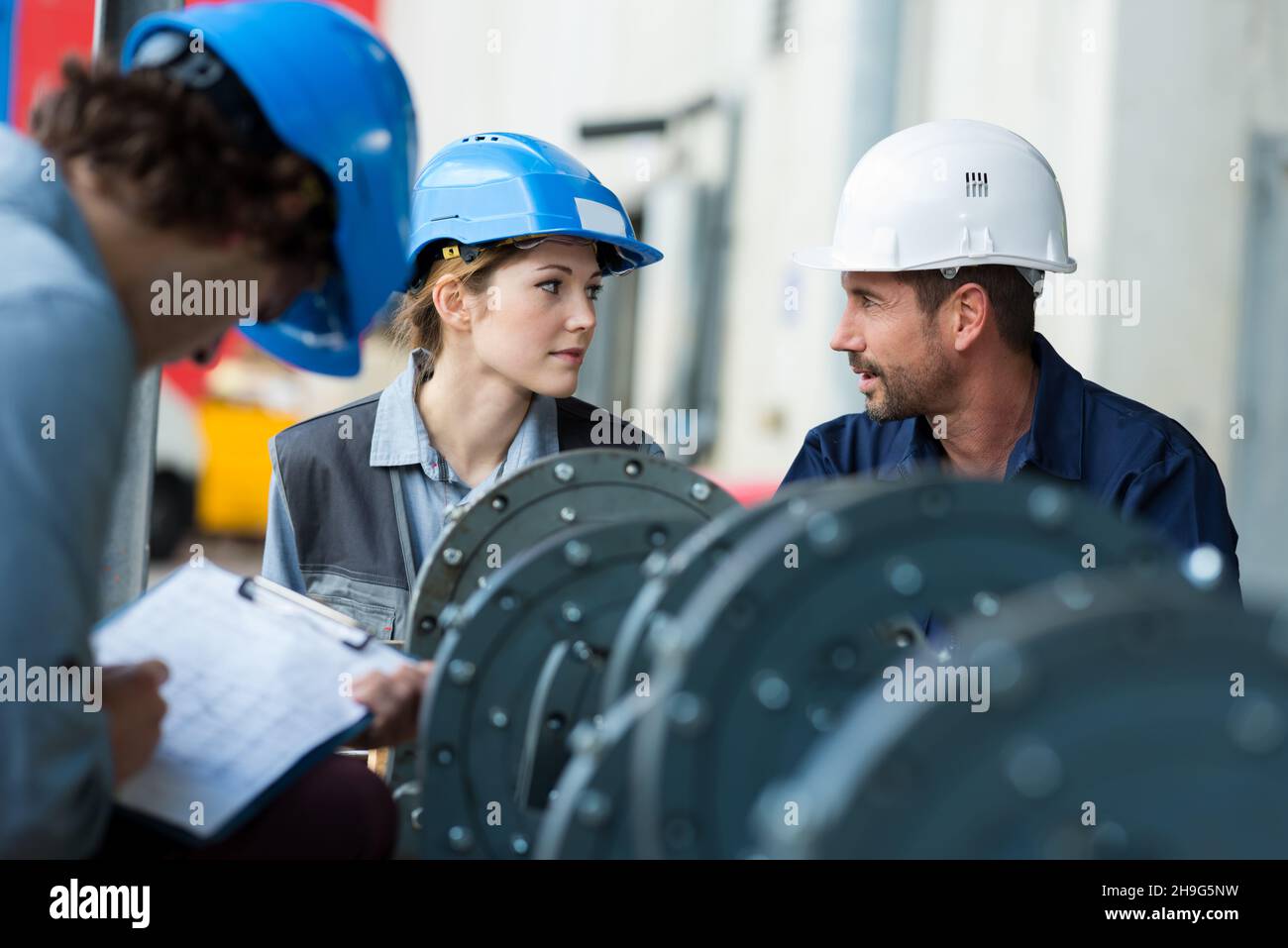 engineers in discussion Stock Photo - Alamy