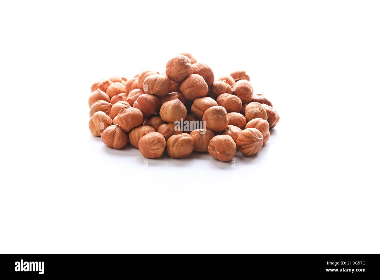 purified hazelnuts isolated white Stock Photo - Alamy