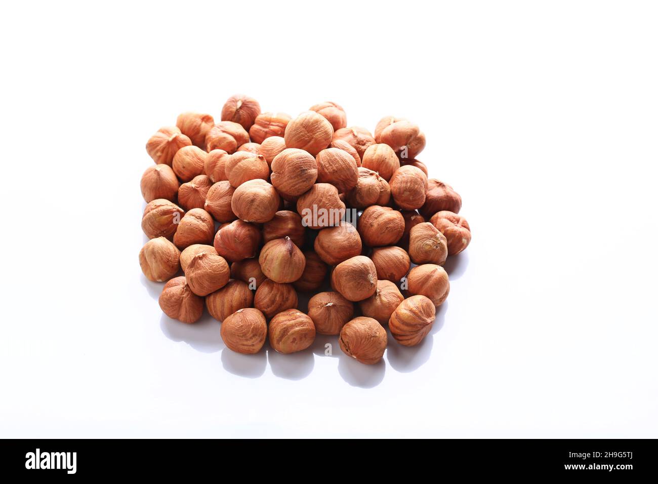 purified hazelnuts isolated white Stock Photo - Alamy
