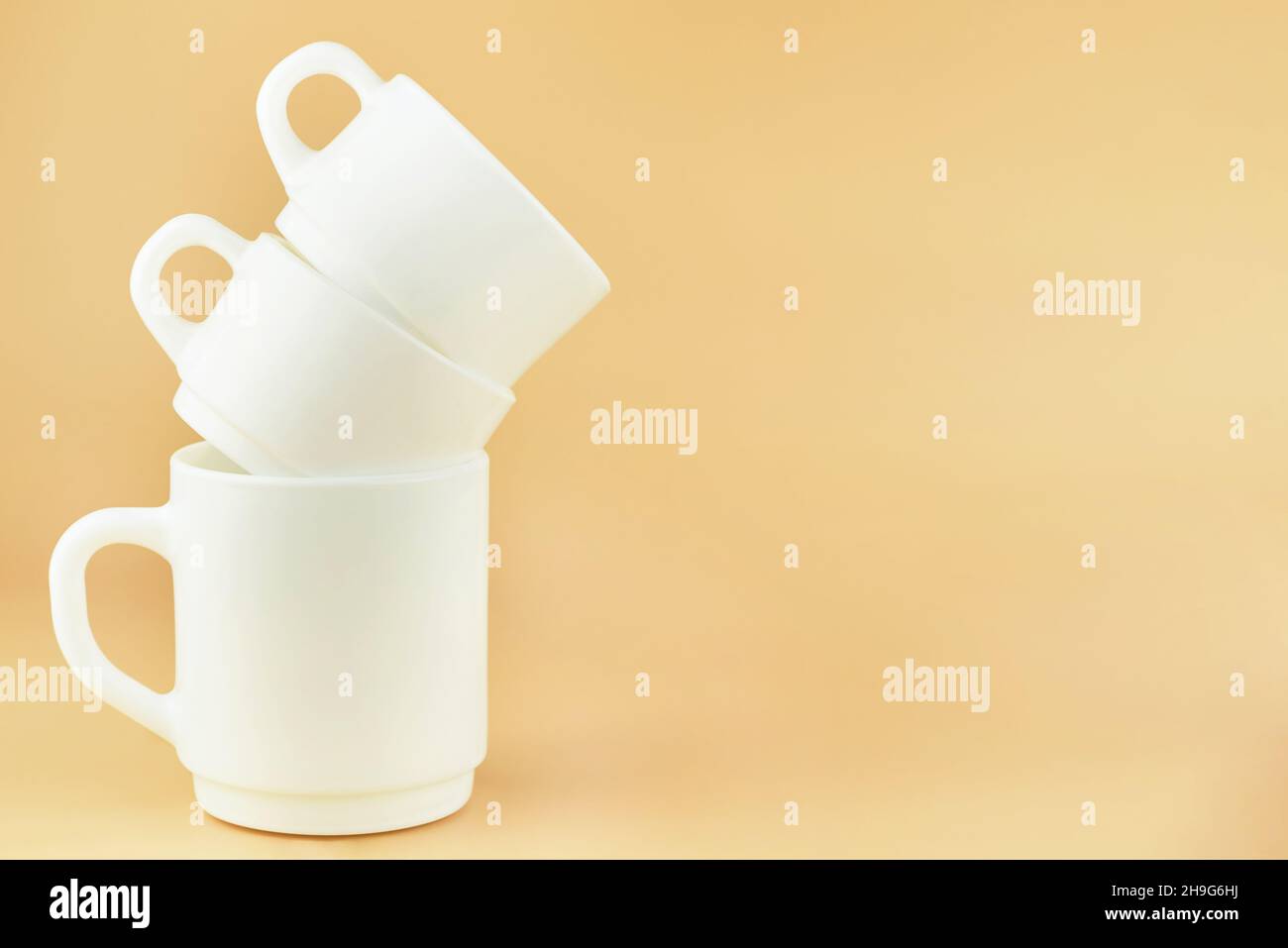 Three clean empty coffee or tea cups Stock Photo - Alamy