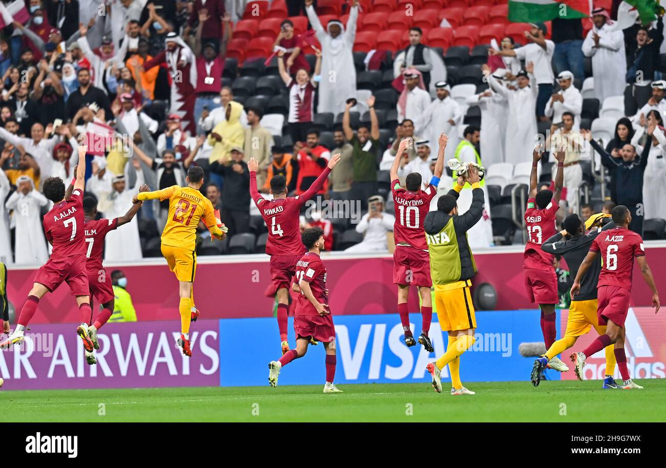 Doha, Qatar. 6th Dec, 2021. Players of Qatar celebrate after winning ...
