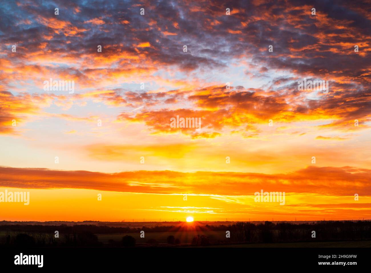 Sunrise over the flat south east Kent landscape in England. Sun rising ...