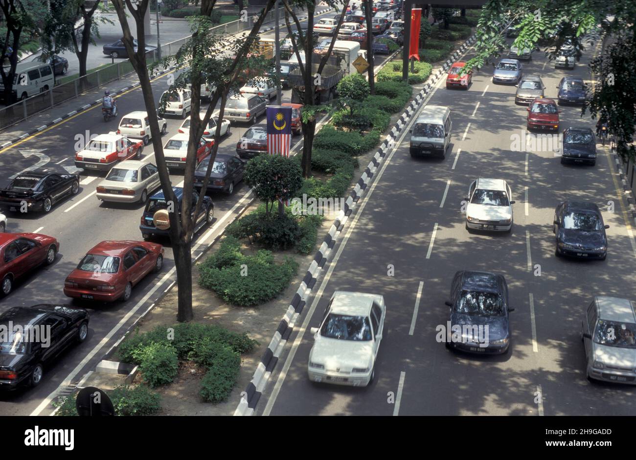cars and Trafic on a road in the city of Kuala Lumpur in Malaysia ...