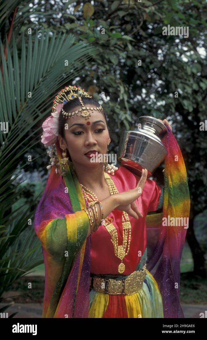 Women in traditional malay dress in the city of Kuala Lumpur in ...