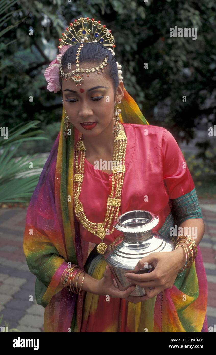 Women in traditional malay dress in the city of Kuala Lumpur in ...