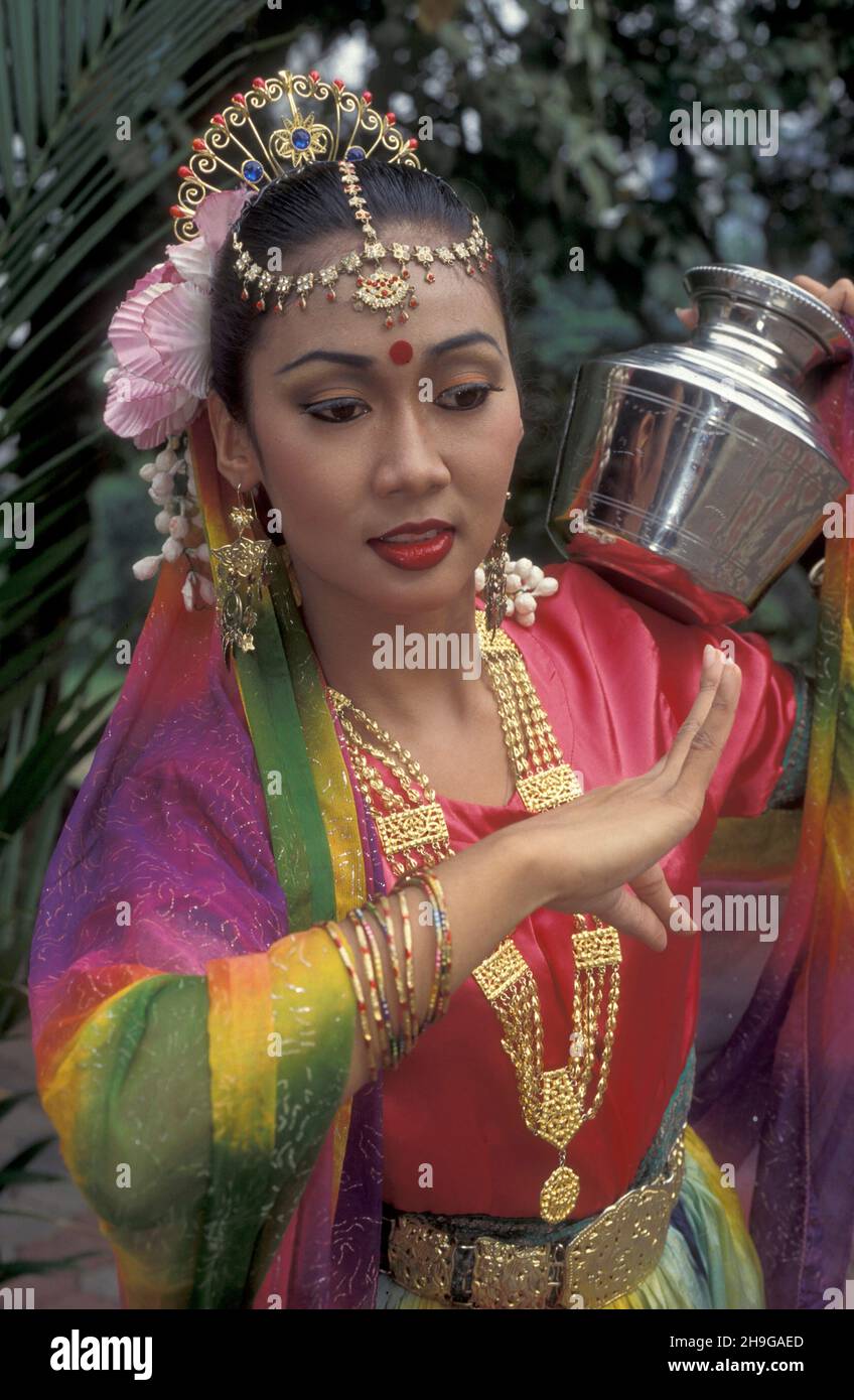 Women in traditional malay dress in the city of Kuala Lumpur in ...