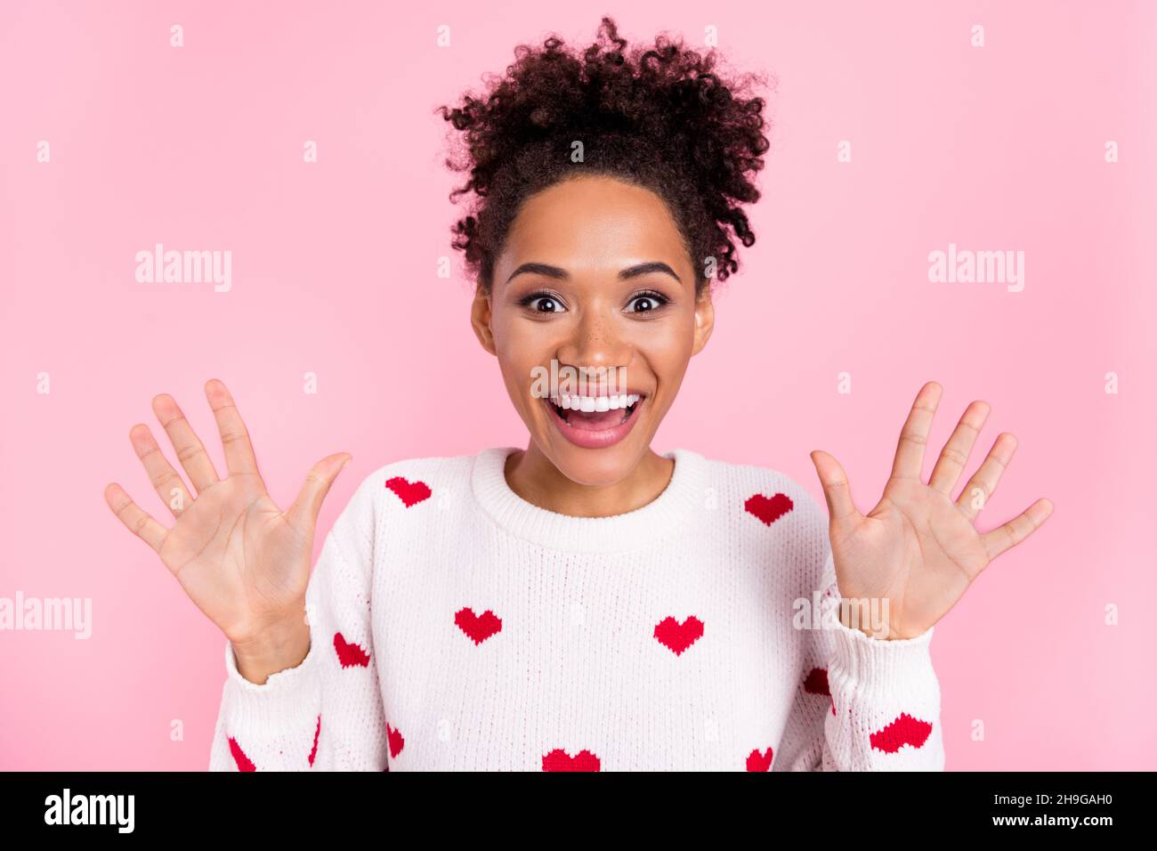 Photo Of Cute Curly Hairdo Millennial Lady Show Arms Wear White Sweater