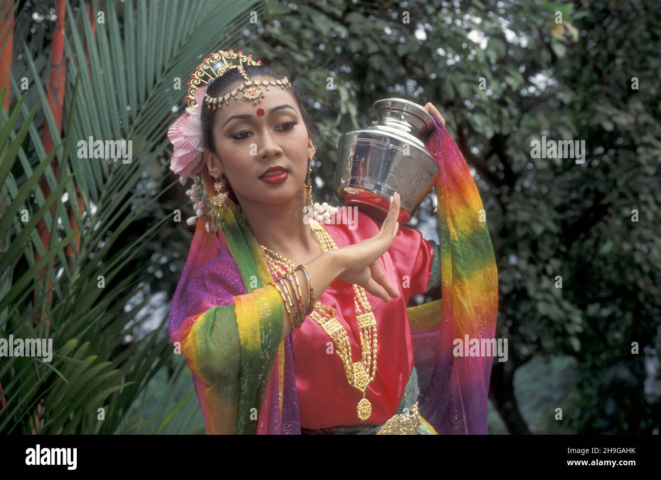 Women in traditional malay dress in the city of Kuala Lumpur in ...
