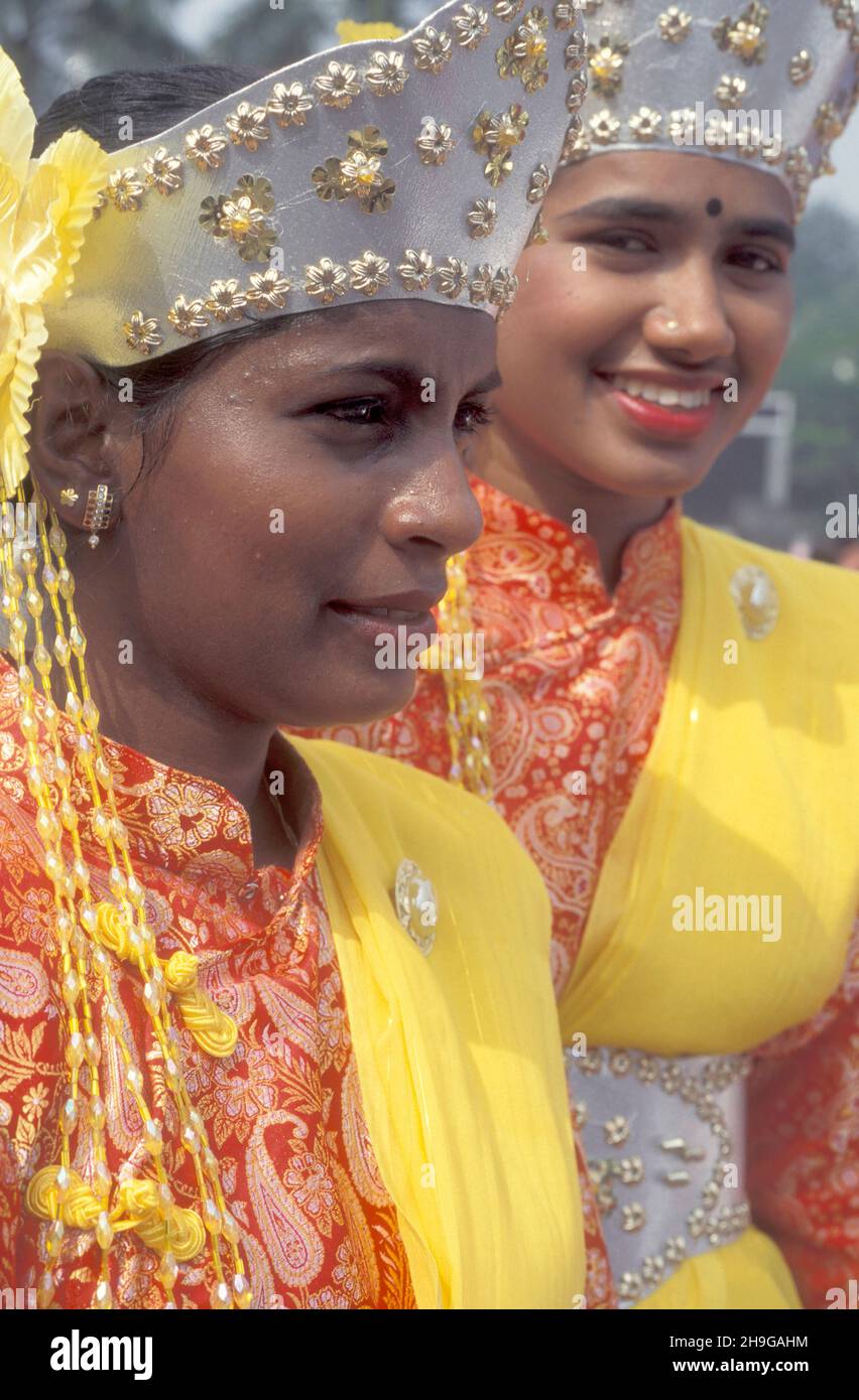 Women in traditional malay dress in the city of Kuala Lumpur in ...