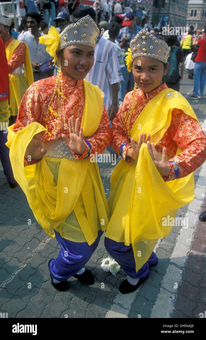 Women in traditional malay dress in the city of Kuala Lumpur in ...