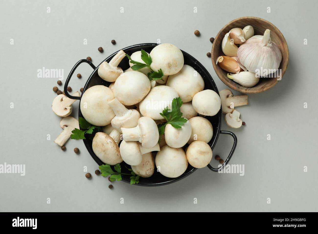 Concept of tasty food with champignon on white Stock Photo - Alamy